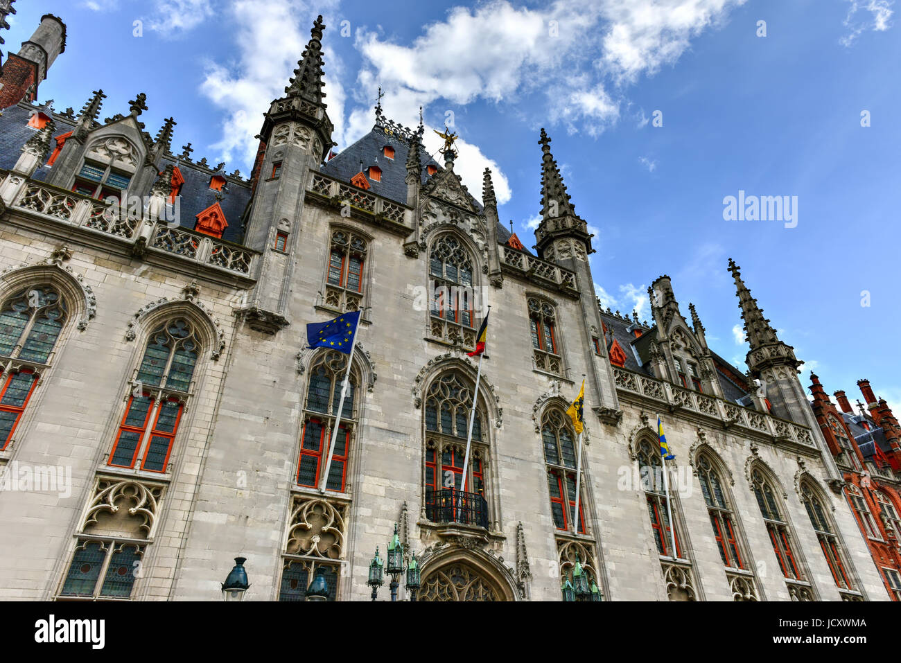 Famous old colorful buildings at Market square in Bruges, Belgium ...