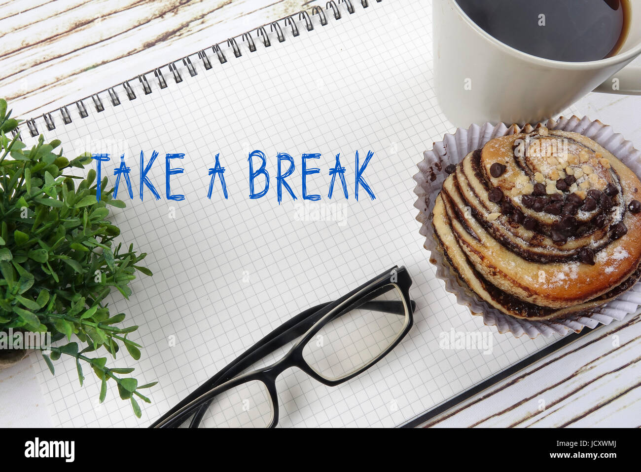 Business concept of simple breakfast, coffee and croissant with note ...