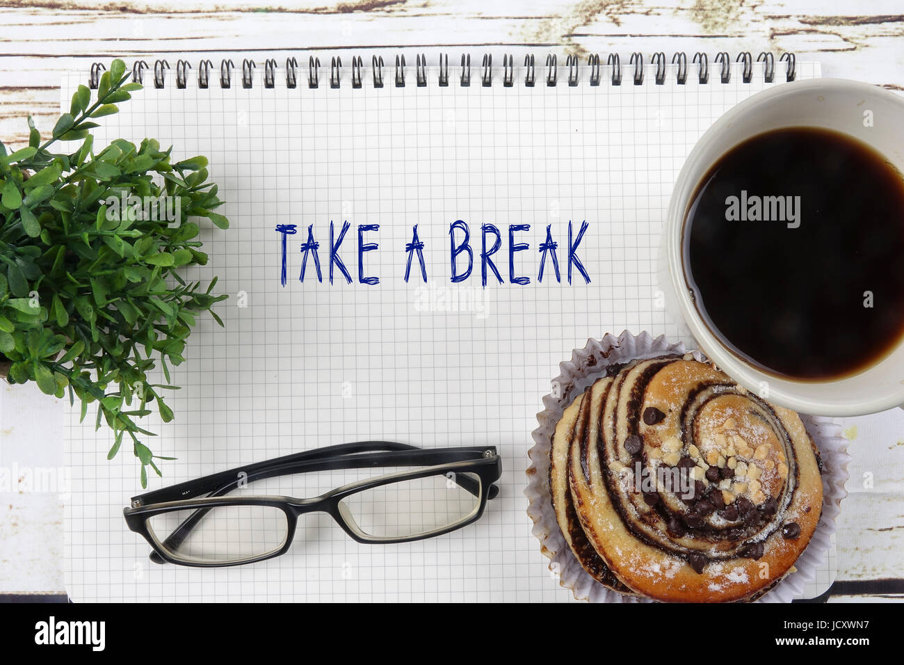 Business concept of simple breakfast, coffee and croissant with note ...