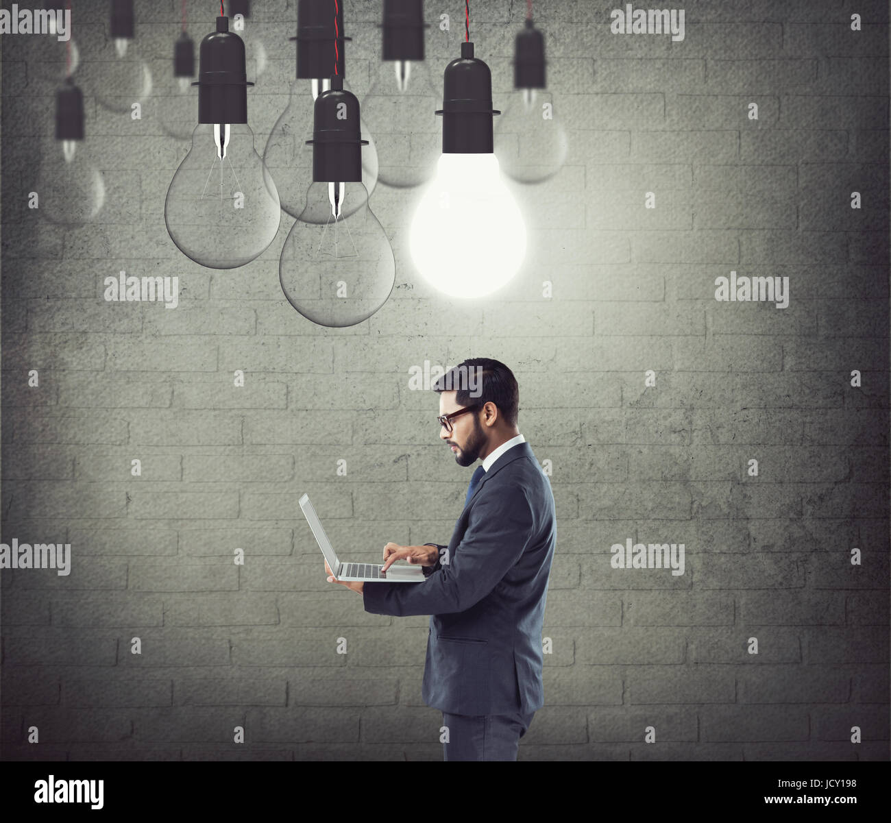 Laptop with glowing light hi-res stock photography and images - Alamy