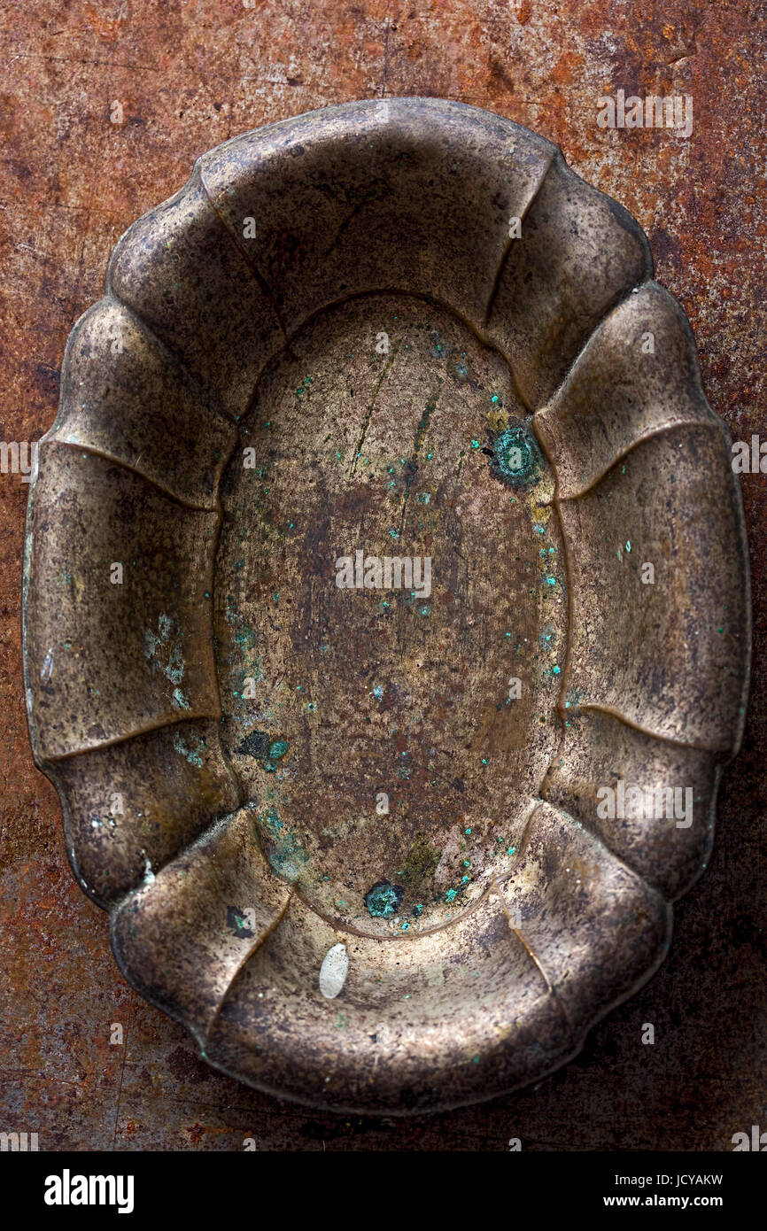 Vintage platter on rustic metal sheet Stock Photo - Alamy