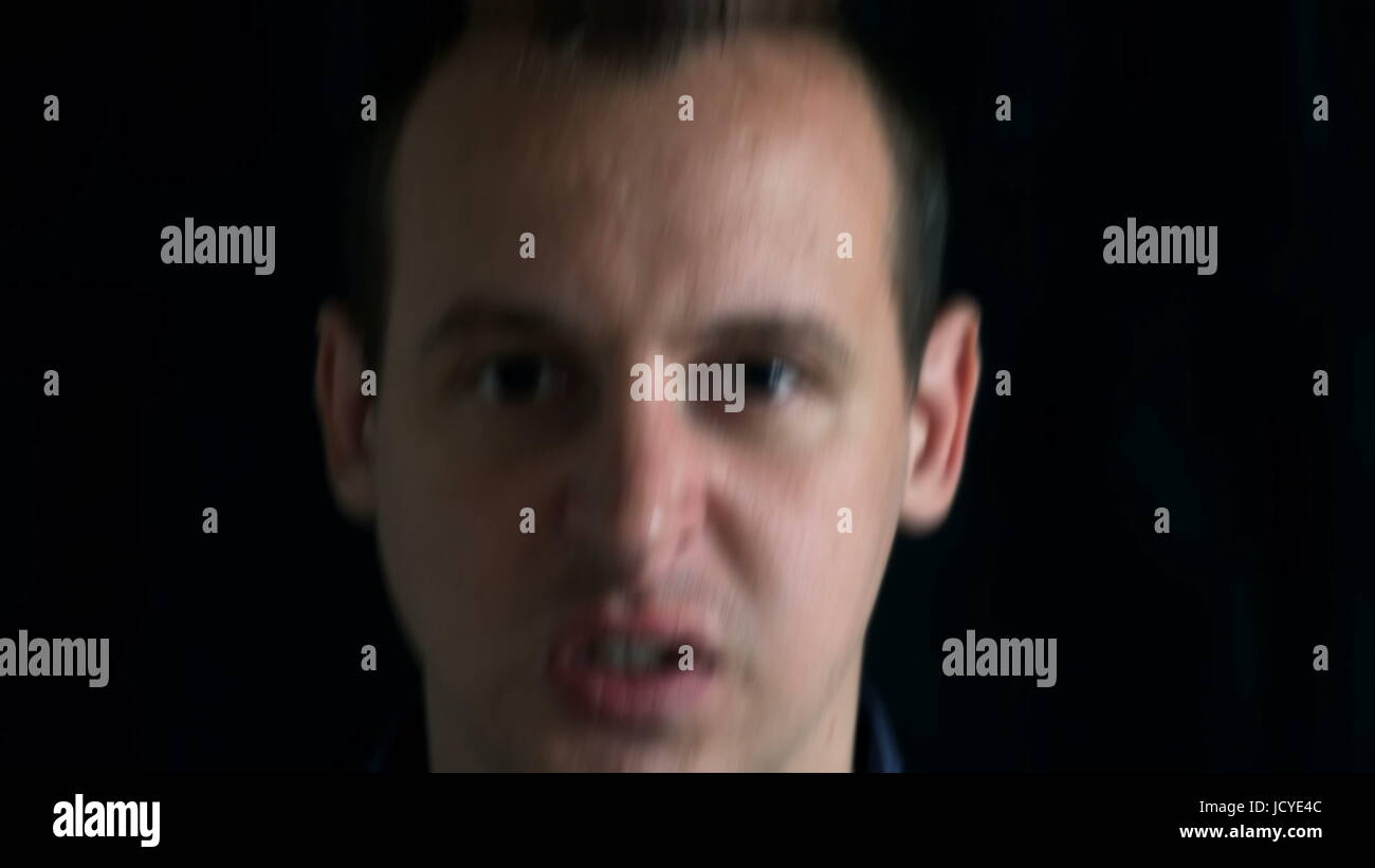 The face of evil men distorted random characters. Concept: a glitch in ...