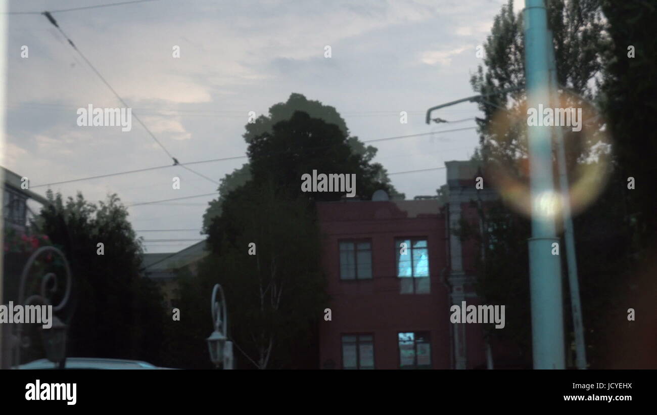 reflection of buildings in a shop window with a beautiful decorative ...