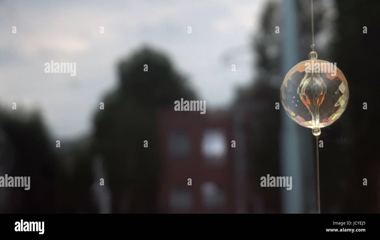 reflection of buildings in a shop window with a beautiful decorative ...
