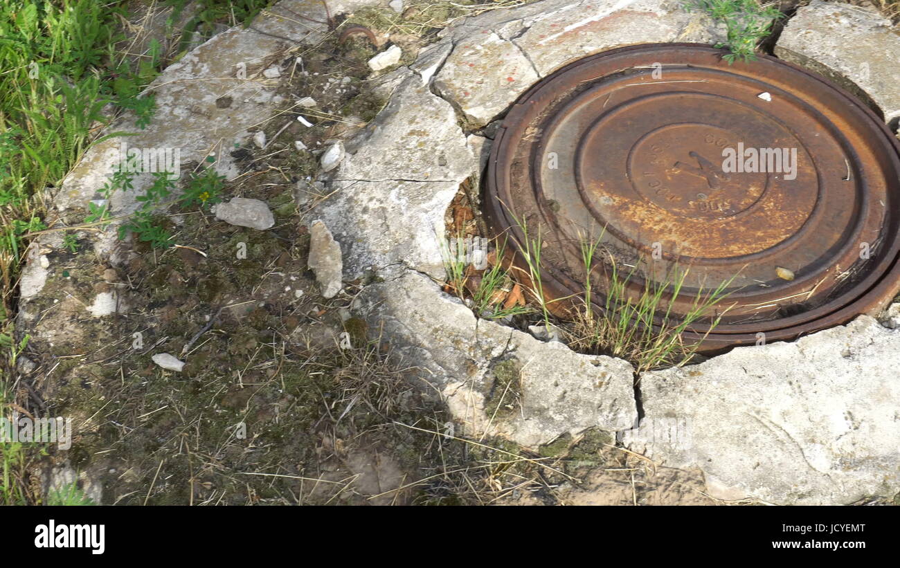 old manhole , rusted and broken Stock Photo - Alamy