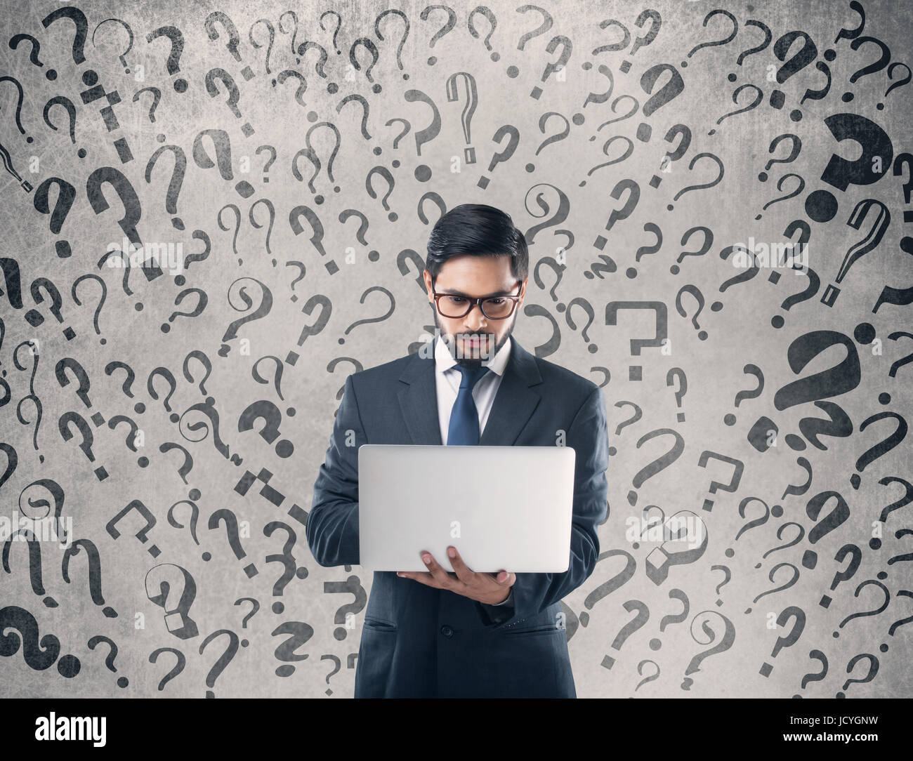 Businessman trying to solve the problems Stock Photo - Alamy
