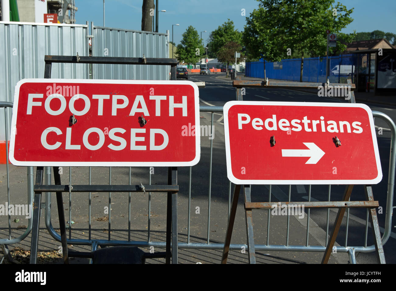 british roadwork signs stating footpath closed and indicating a ...