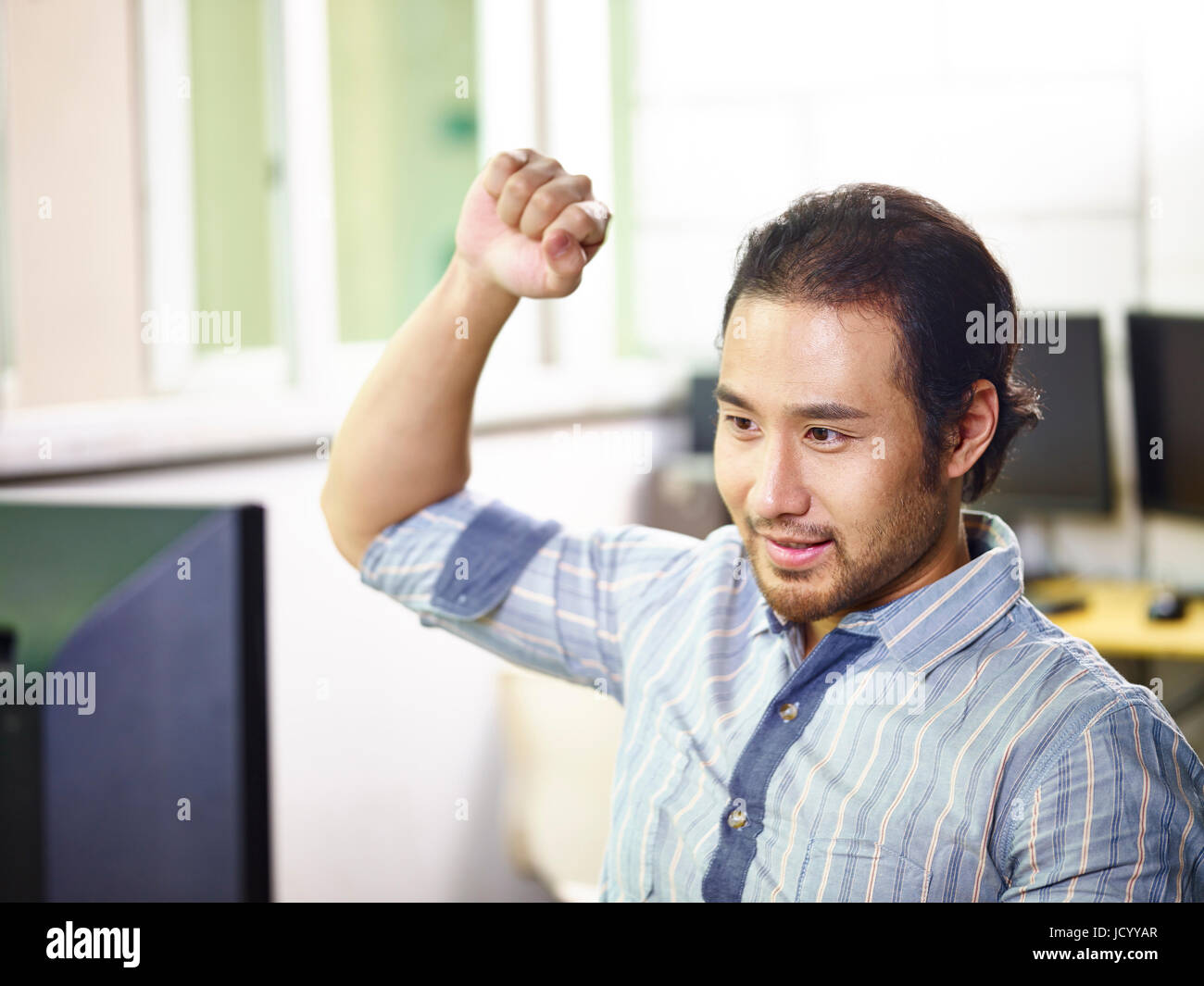 asian businessman working in office using computer Stock Photo - Alamy
