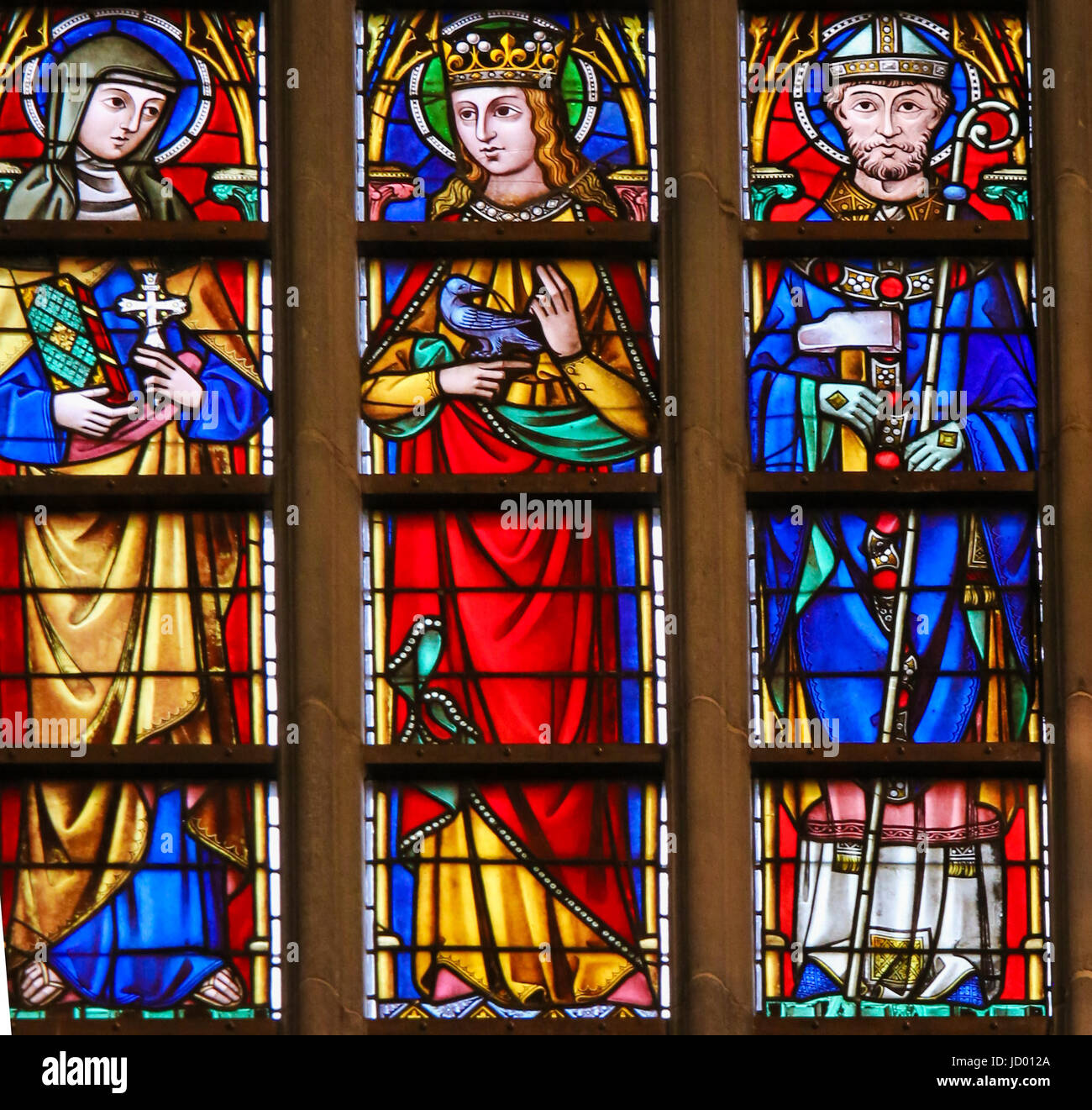 Stained Glass window depicting Catholic Saints including Saint Eligius ...
