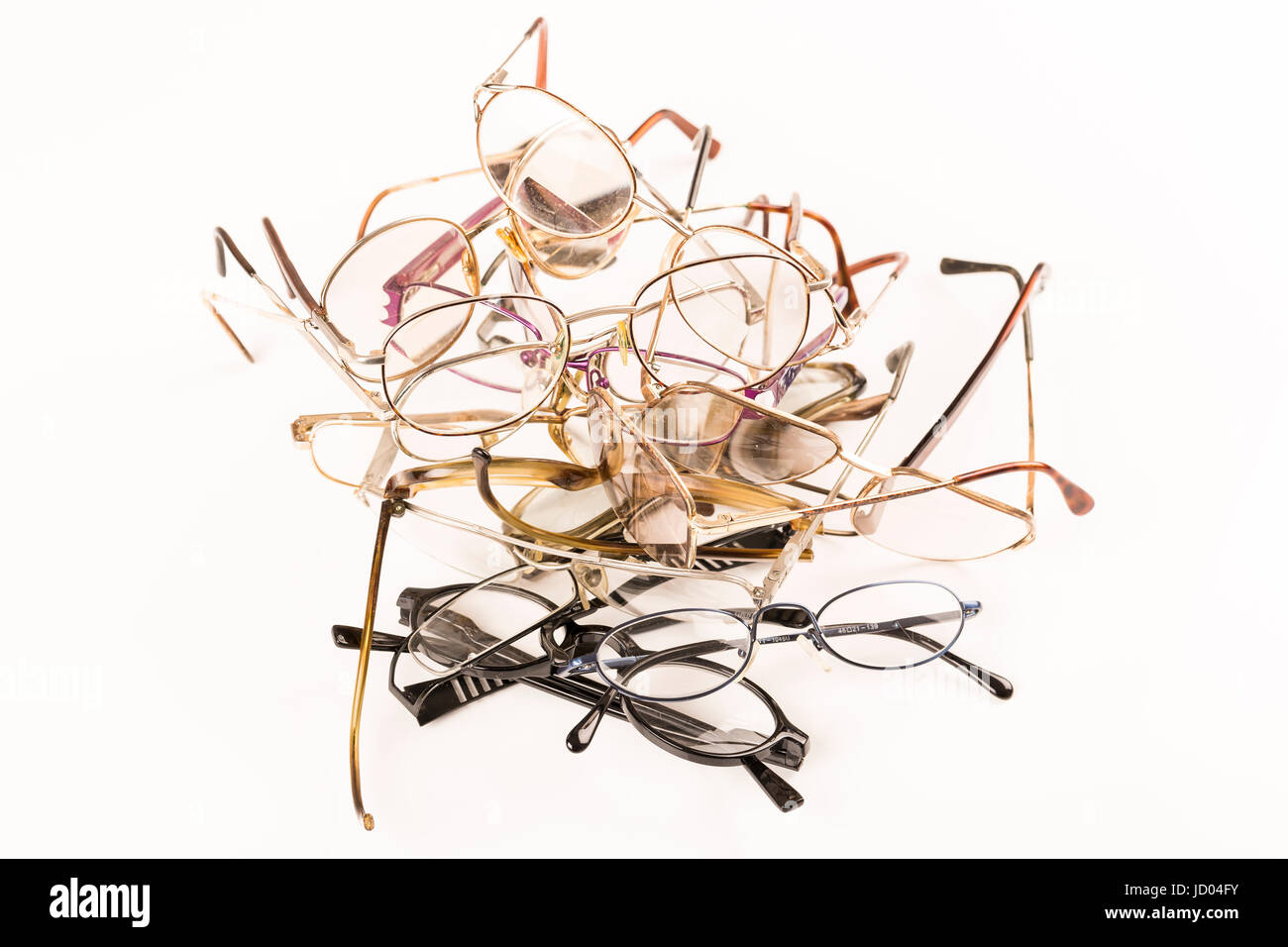 Cluster, pile of old eye glasses on with table, ready to recycle Stock ...