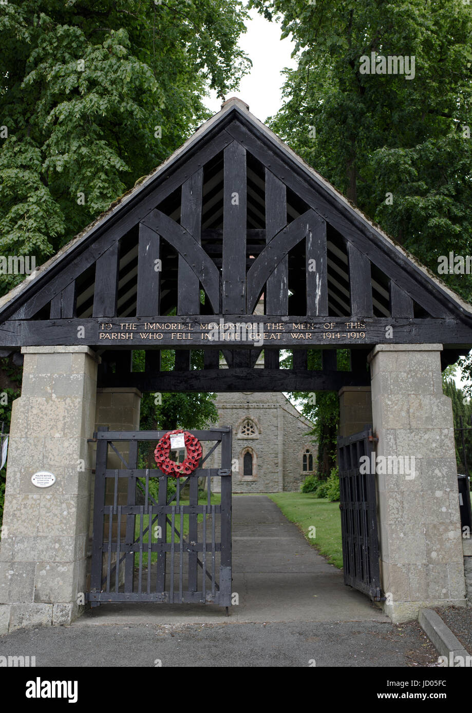 Berriew war memorial stone and timber lychgate with steep roof in ...