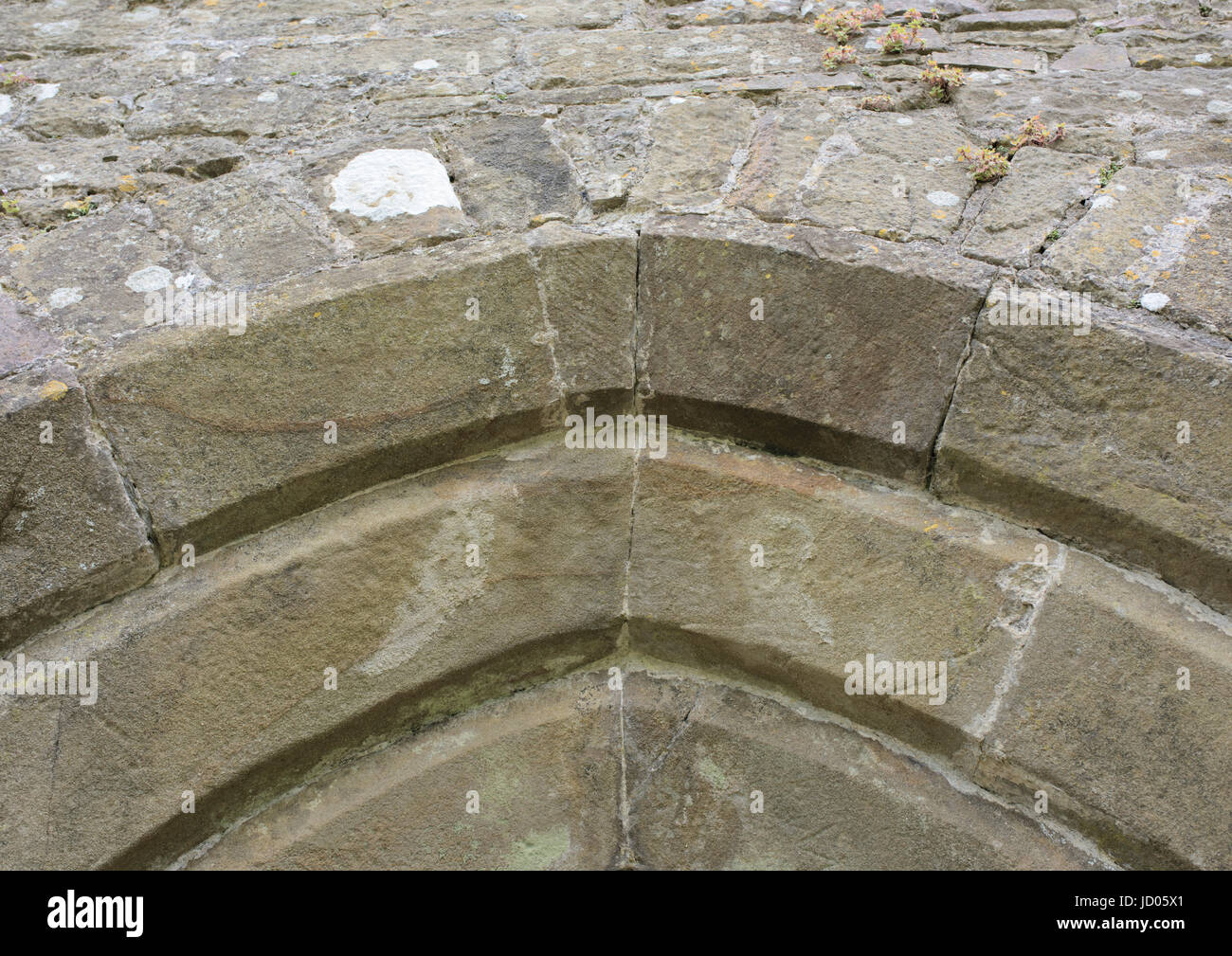 Stone arch architectural detail on medieval doorway in southwest wales ...