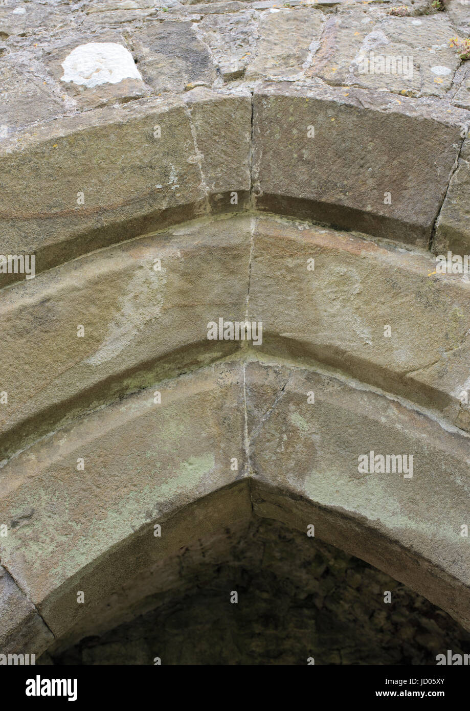 Stone arch architectural detail on medieval doorway in southwest wales ...