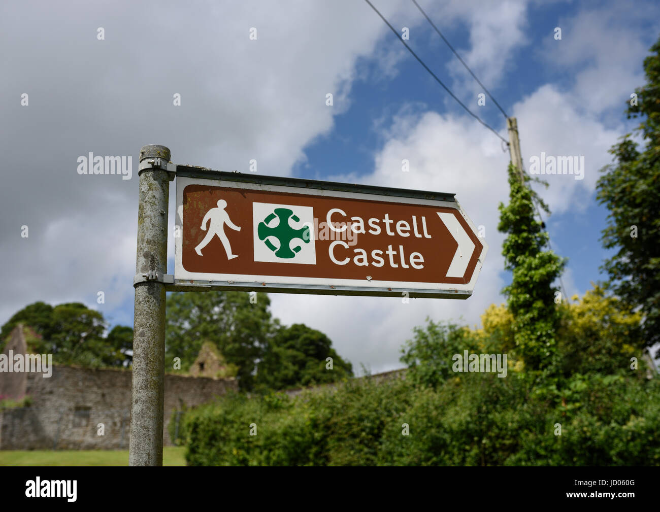 Castle direction sign, bilingual welsh and english fingerpost with ...