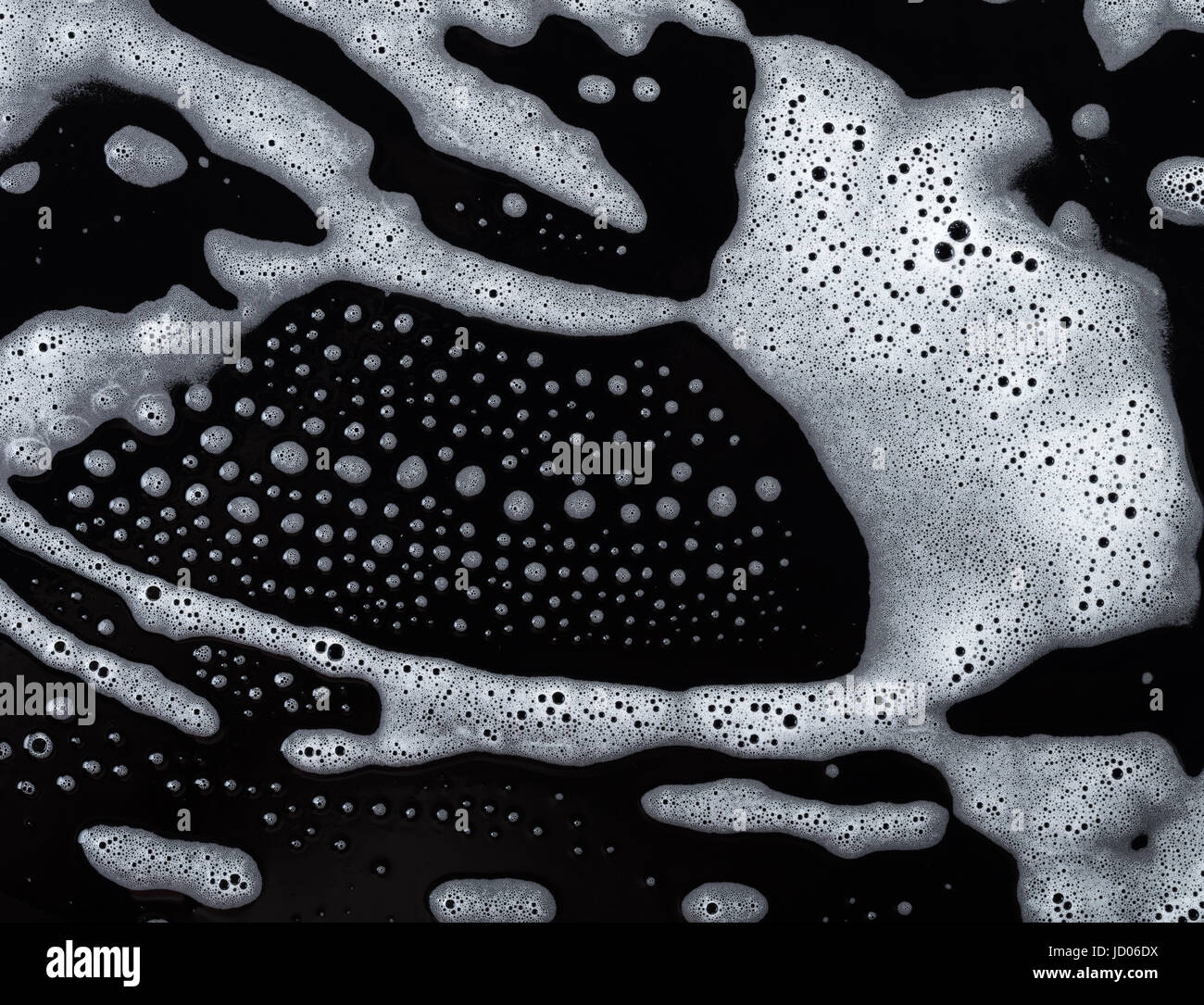 Abstract background, soapy foam texture on black Stock Photo - Alamy