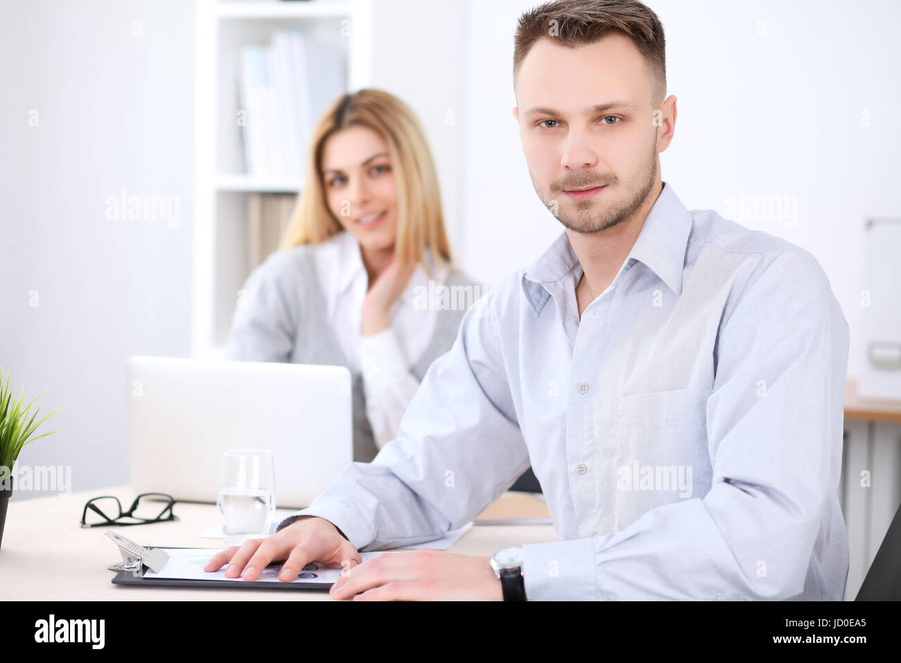 Two successful business partners working at meeting in office Stock ...
