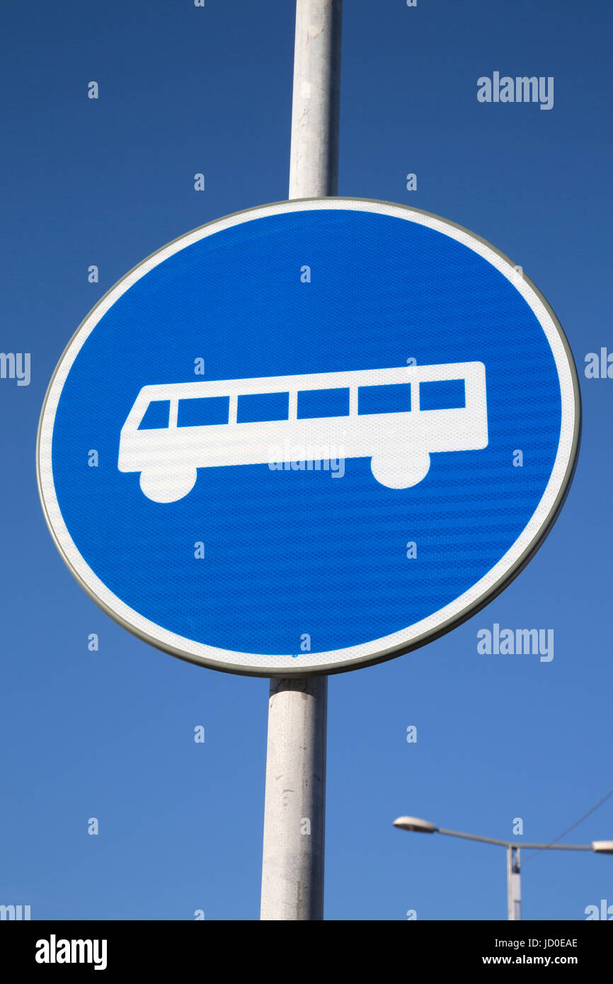 Bus Stop Sign against Blue Sky Background Stock Photo - Alamy