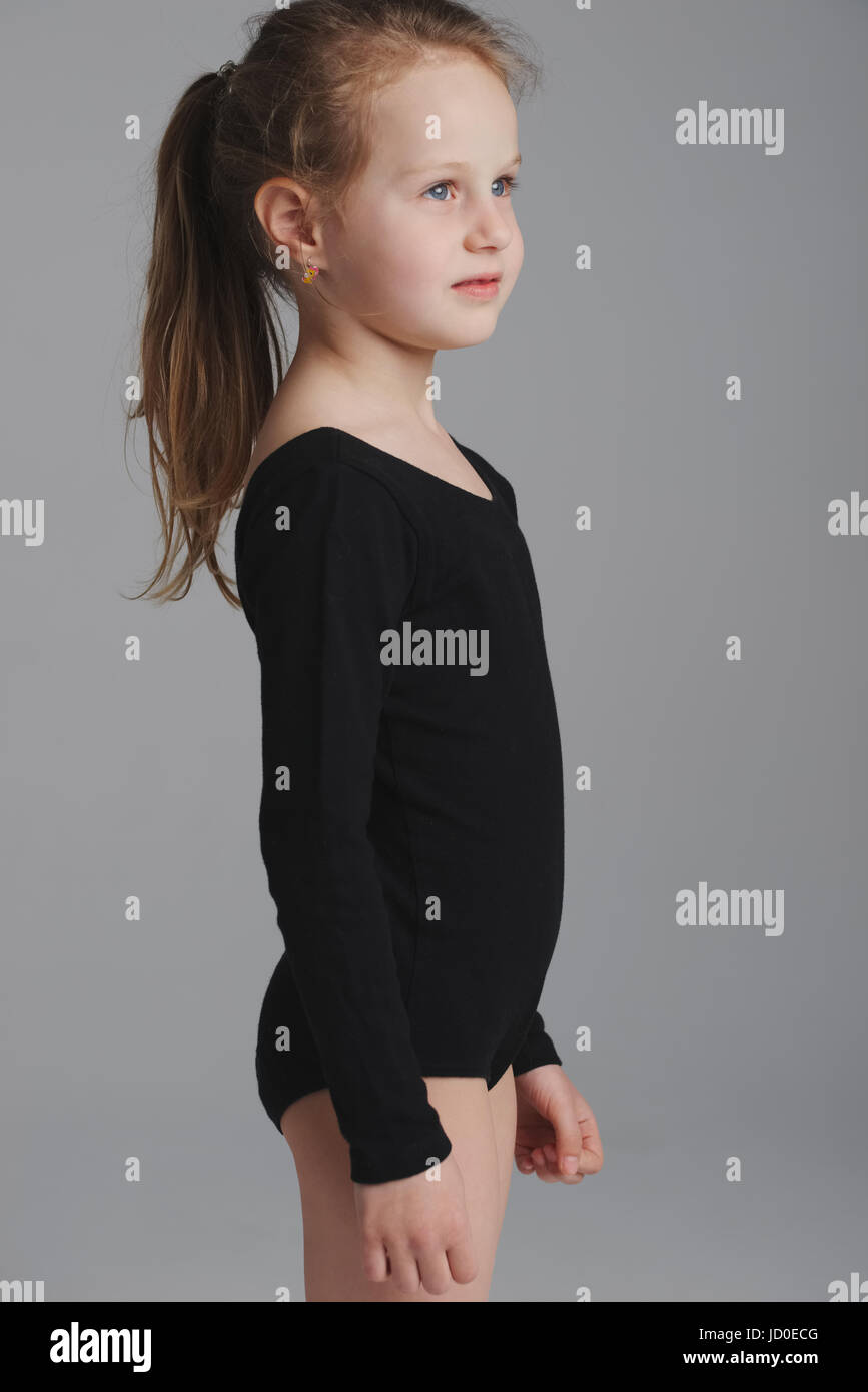 little girl studio portrait on grey background Stock Photo - Alamy