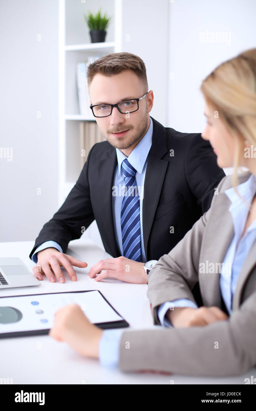 Two successful business partners working at meeting in office Stock ...