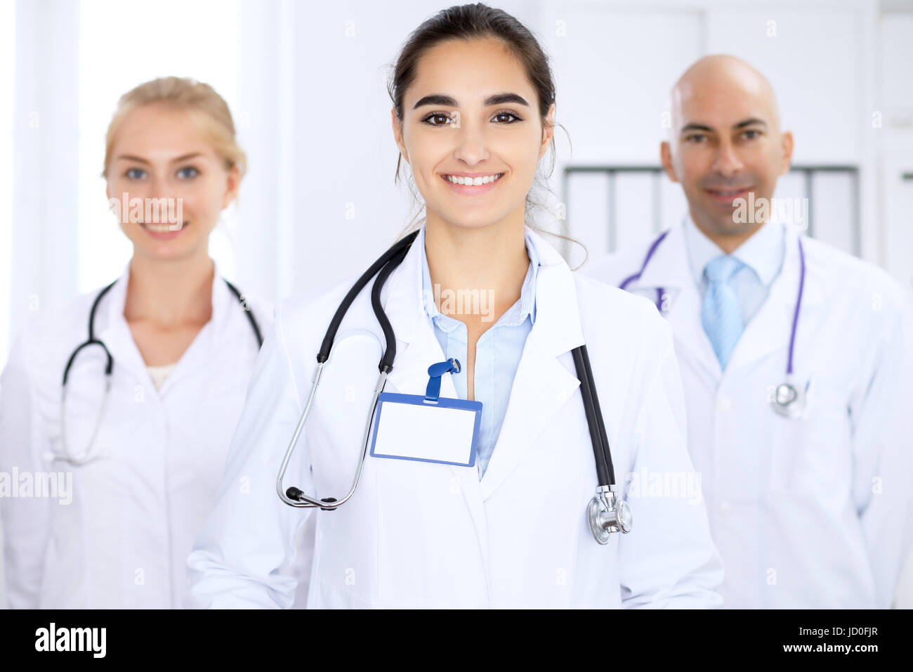 Happy doctor woman with medical staff at the hospital Stock Photo - Alamy