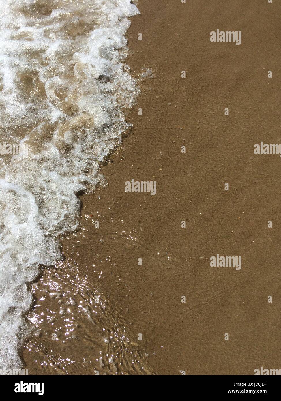 Natural white foam on shore hi-res stock photography and images - Alamy