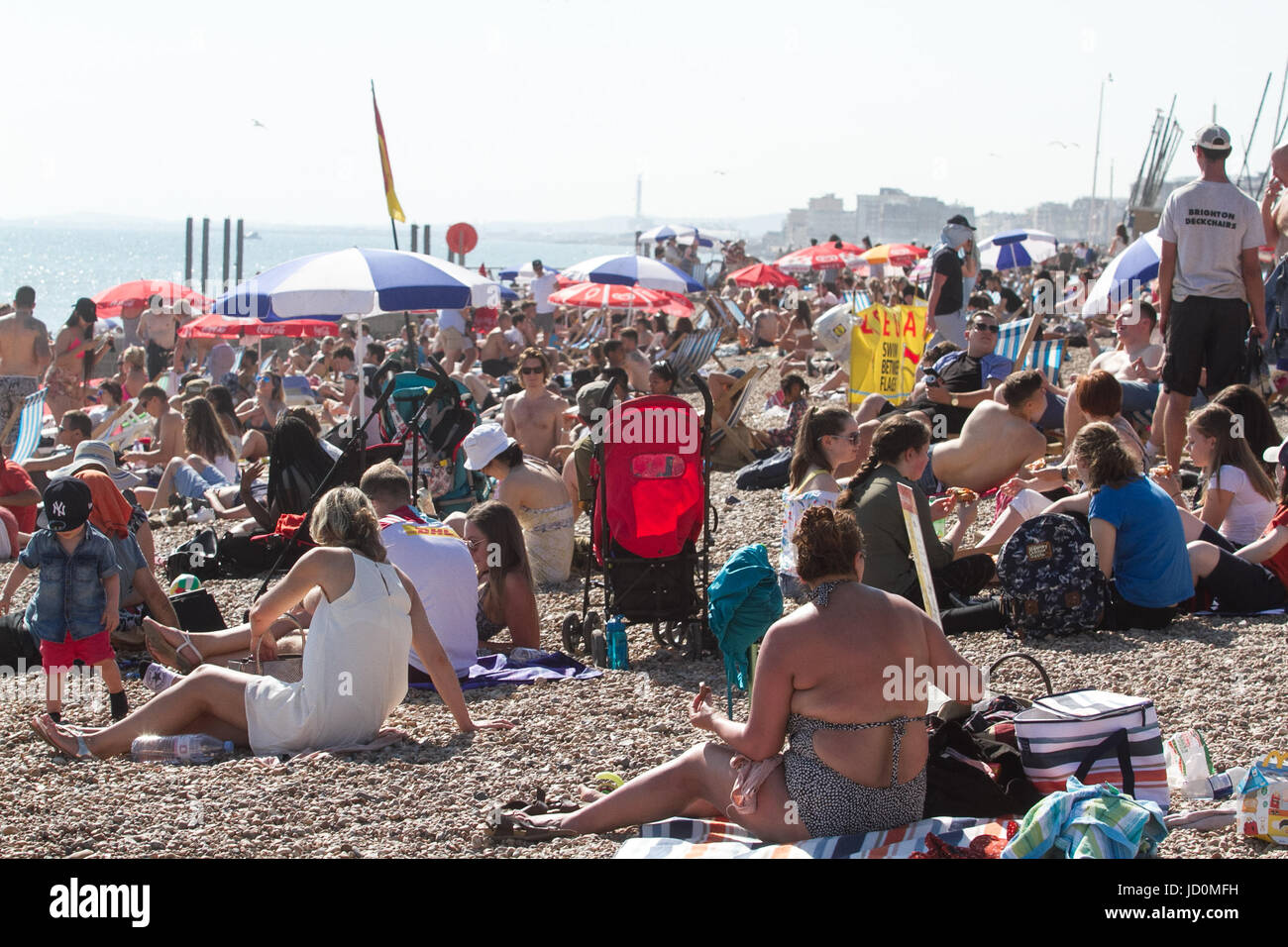 Sun worshippers on beach hi-res stock photography and images - Alamy