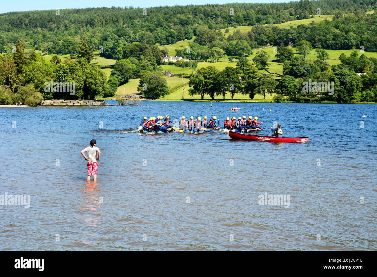 Coniston Water, England. 17 June 2017: Boy watching Teams taking their ...