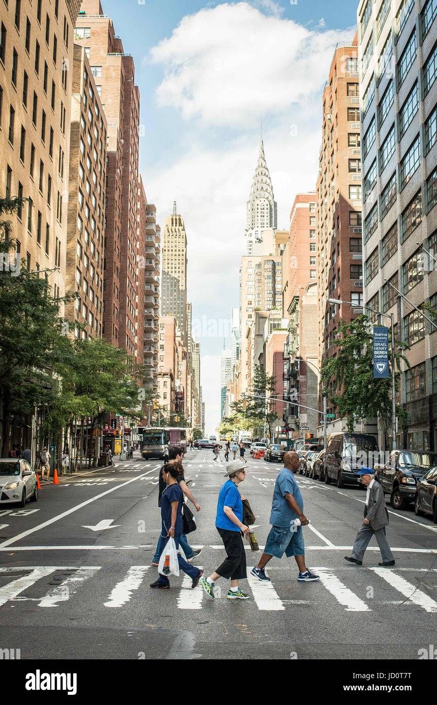 New York City, New York, USA. 15th Aug, 2016. Pedestrians cross a NYC ...
