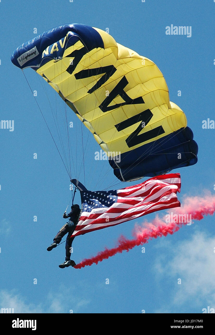 A sailor with the U.S. Navy's parachute demonstration team "The Leap ...