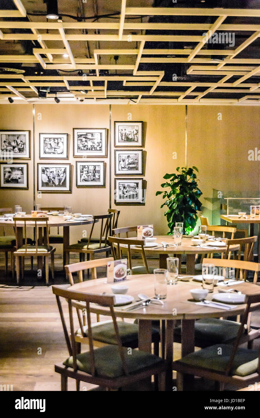 beautiful restaurant and its tables and chairs photo frames on walls ...