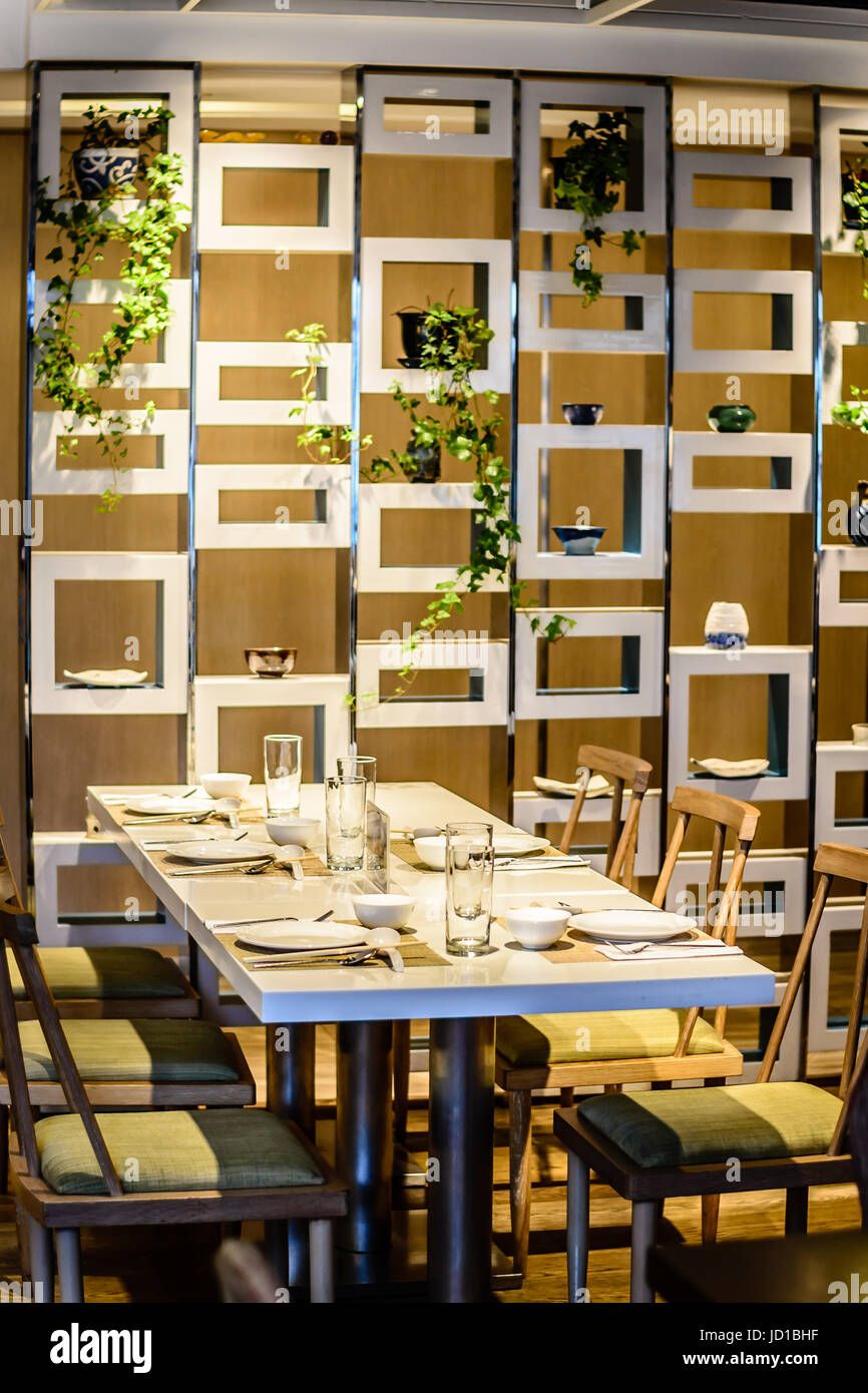 beautiful restaurant and its tables and chairs photo frames on walls ...