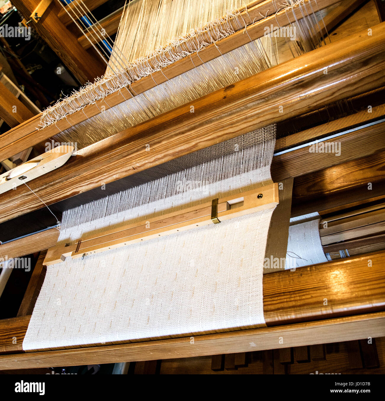 weaving on a loom Stock Photo - Alamy