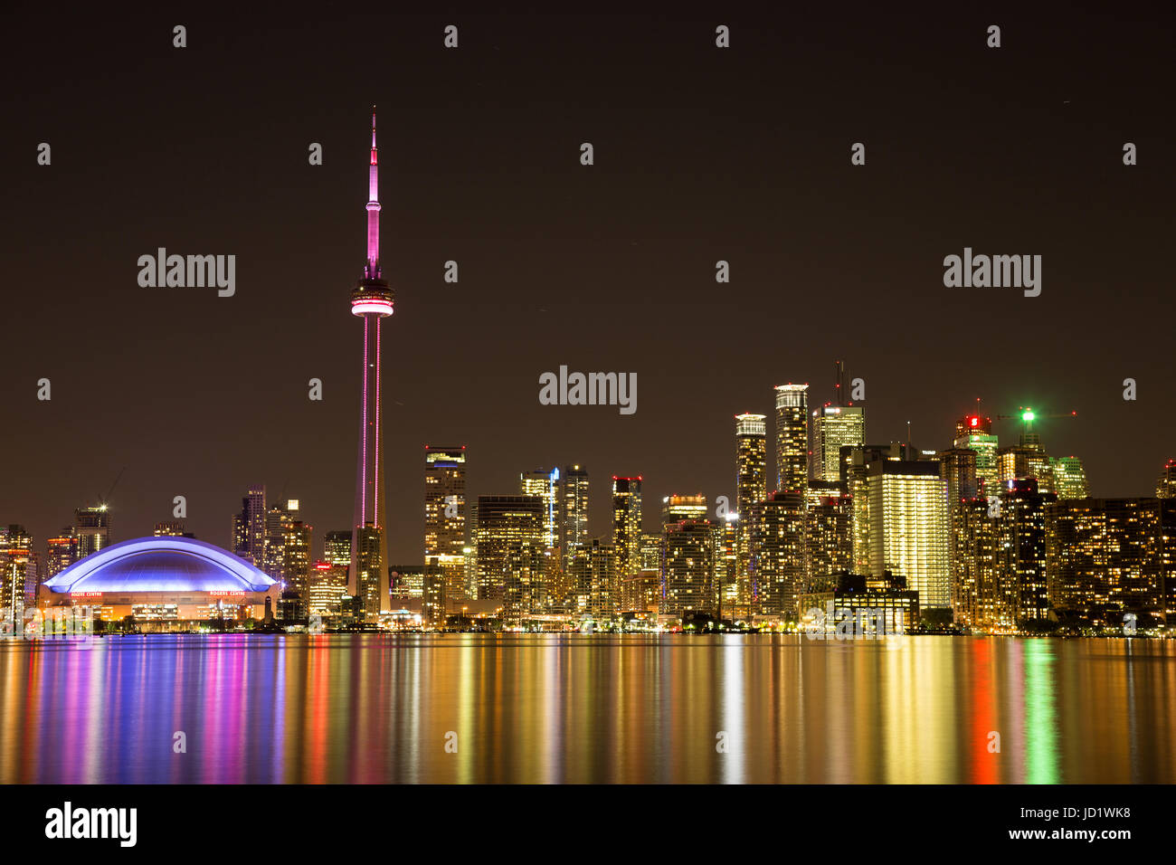 Toronto skyline at night with CN Tower and Rogers Centre Stock Photo ...