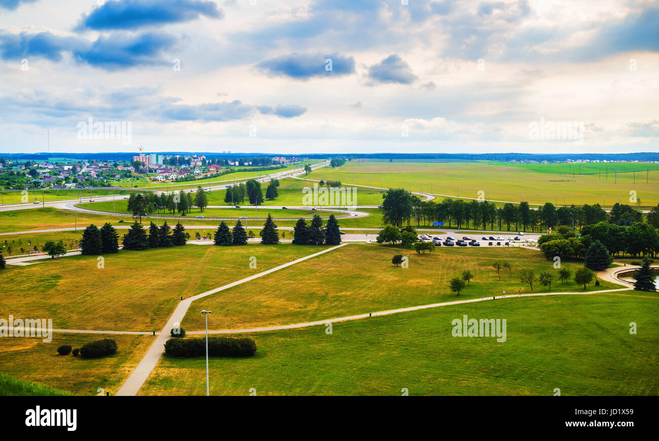 Summer countryside landscape. Green fields, meadows, trees, roads ...