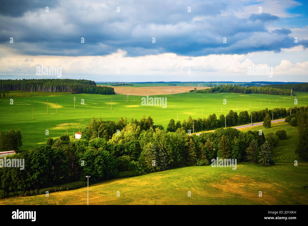 Summer landscape with green meadows, fields, trees and forests. Minsk ...