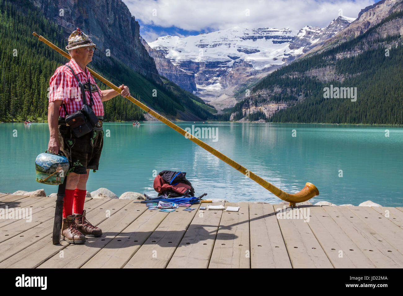 Alp Horn player at Chateau Lake Louise in Banff National Park, Alberta ...