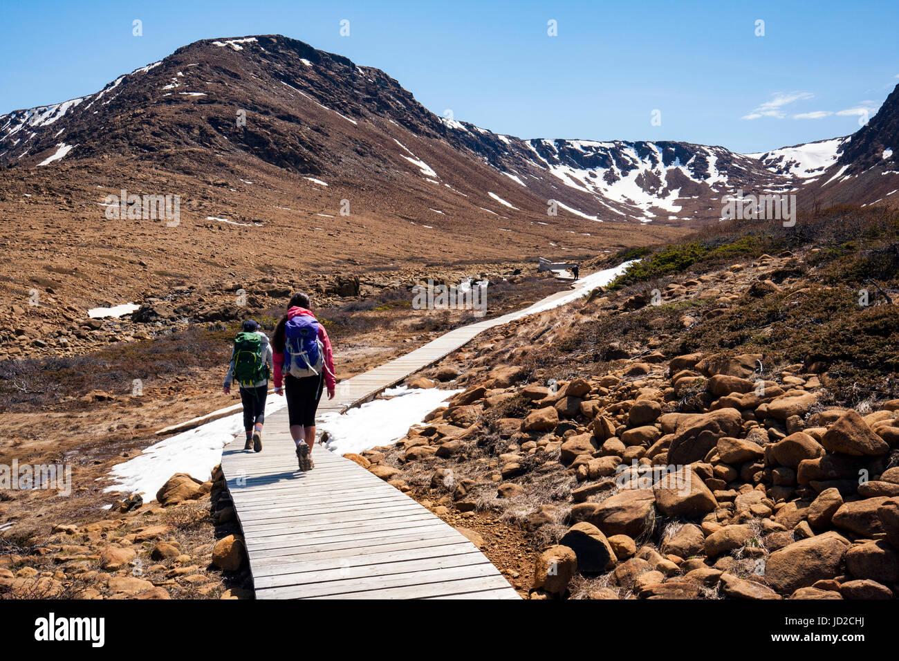 Hikers in the Tablelands, Gros Morne National Park, near Woody Point ...