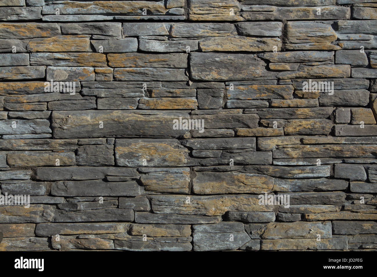 Great looking rock brick wall Stock Photo - Alamy