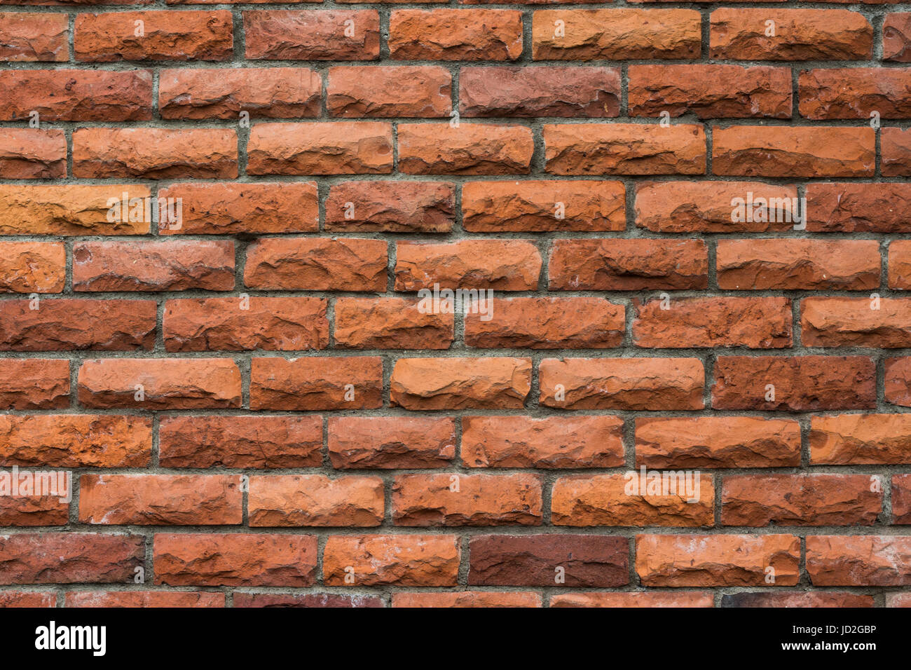 Chipped Bricks in this wall Stock Photo - Alamy