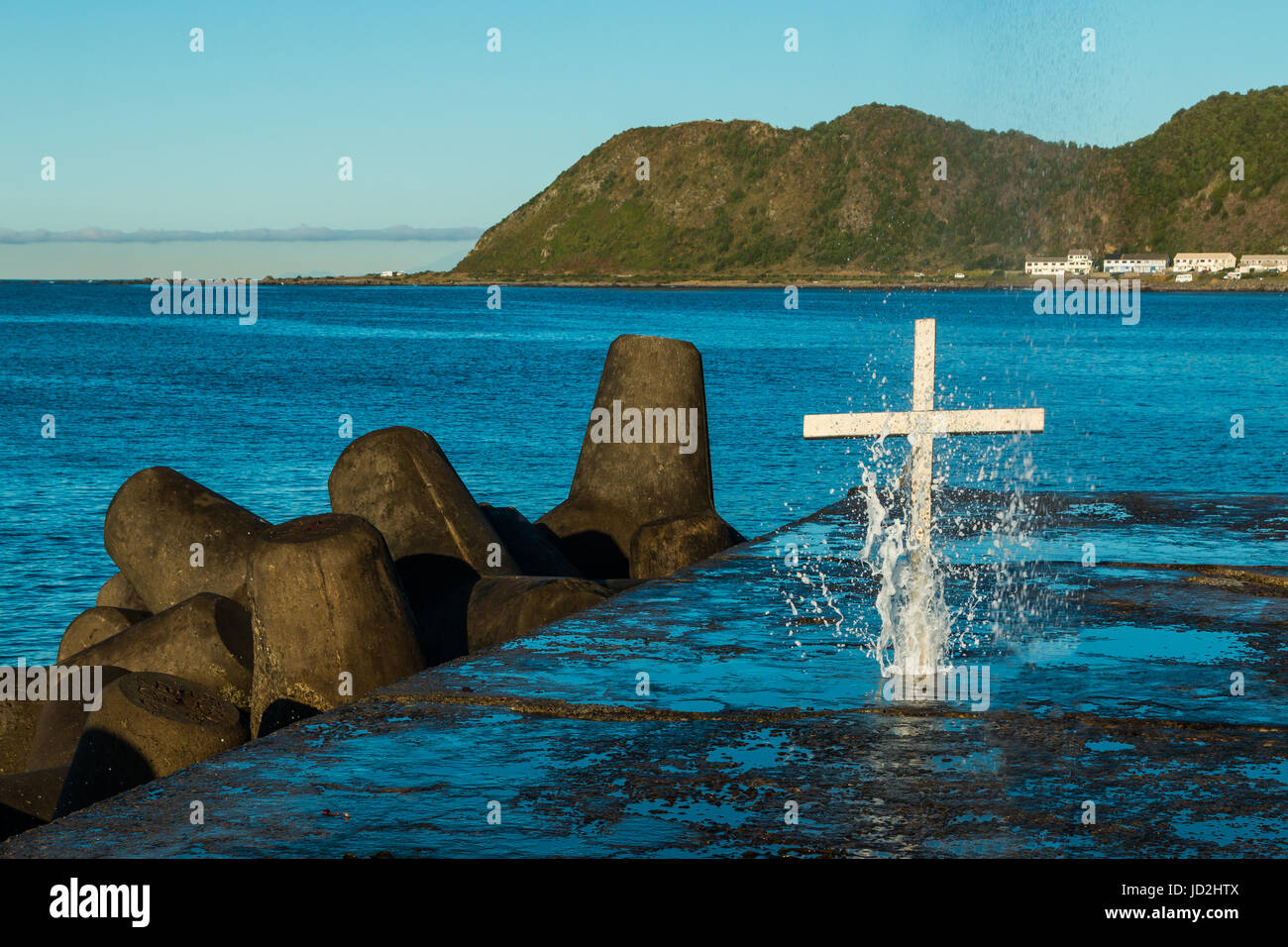 White cross with clean white water splashing up Stock Photo - Alamy