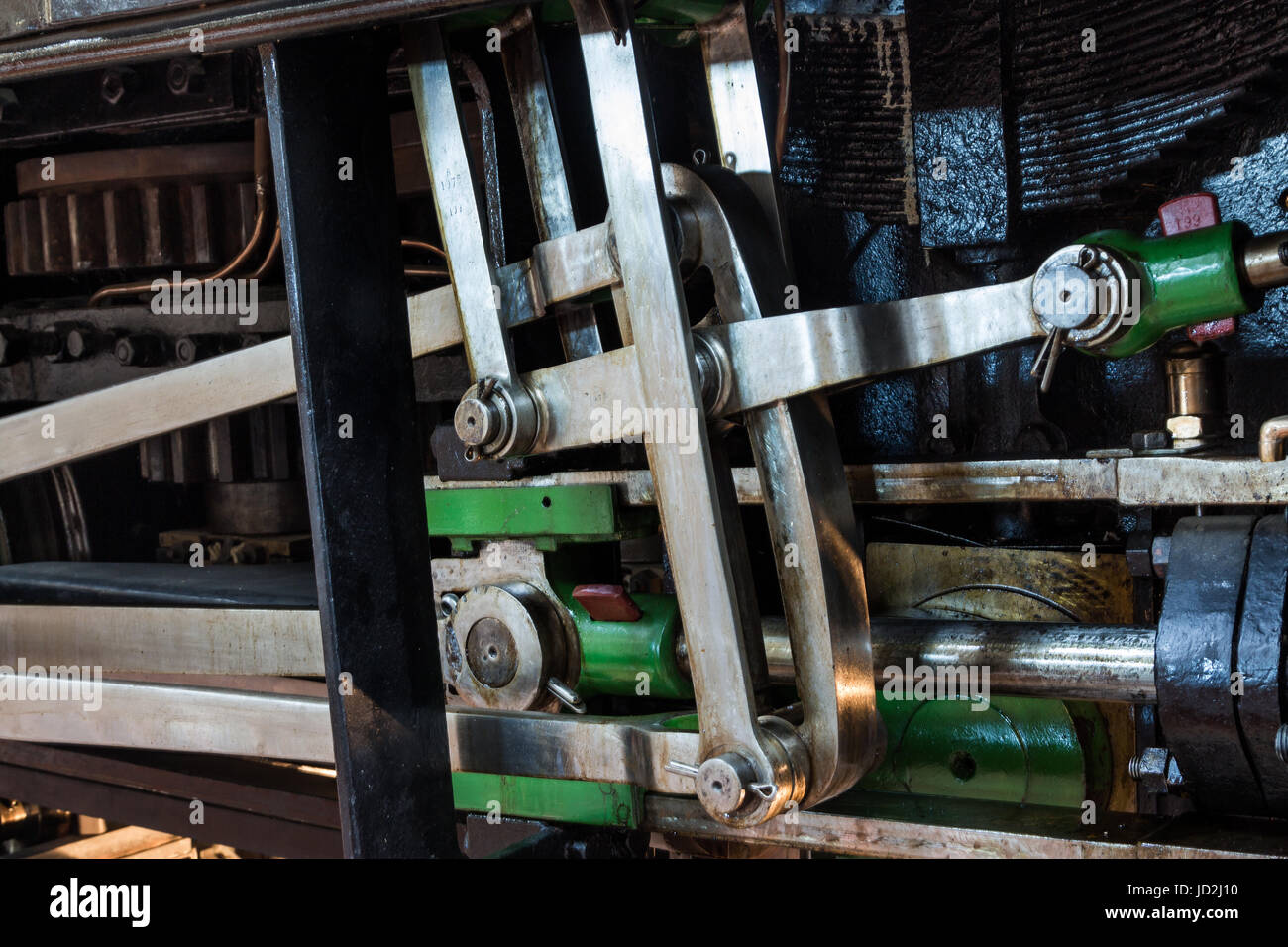 Closeup of a steam train cranks and gearing too Stock Photo - Alamy