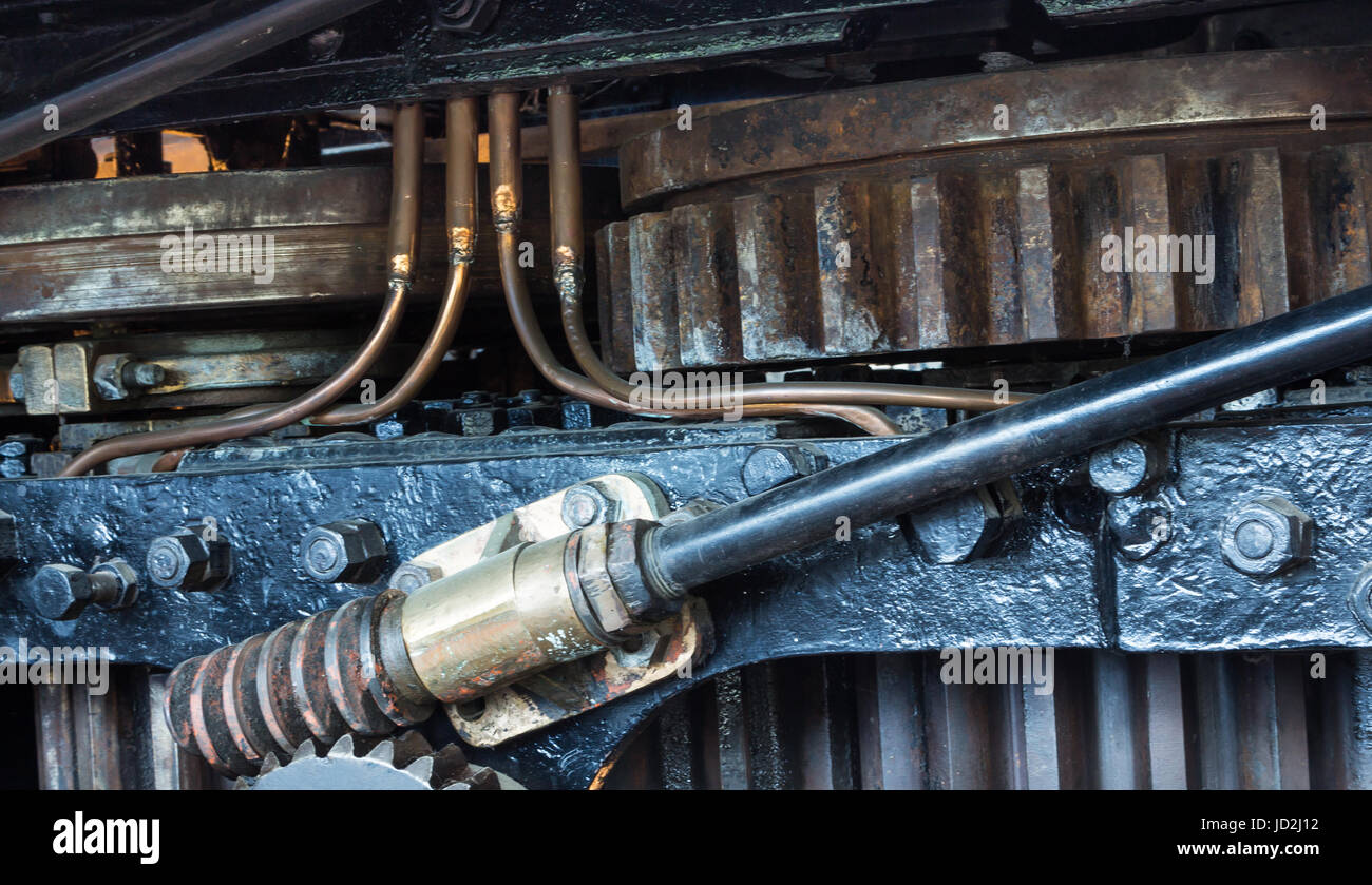 Showing some large gearing under a steam engine Stock Photo - Alamy