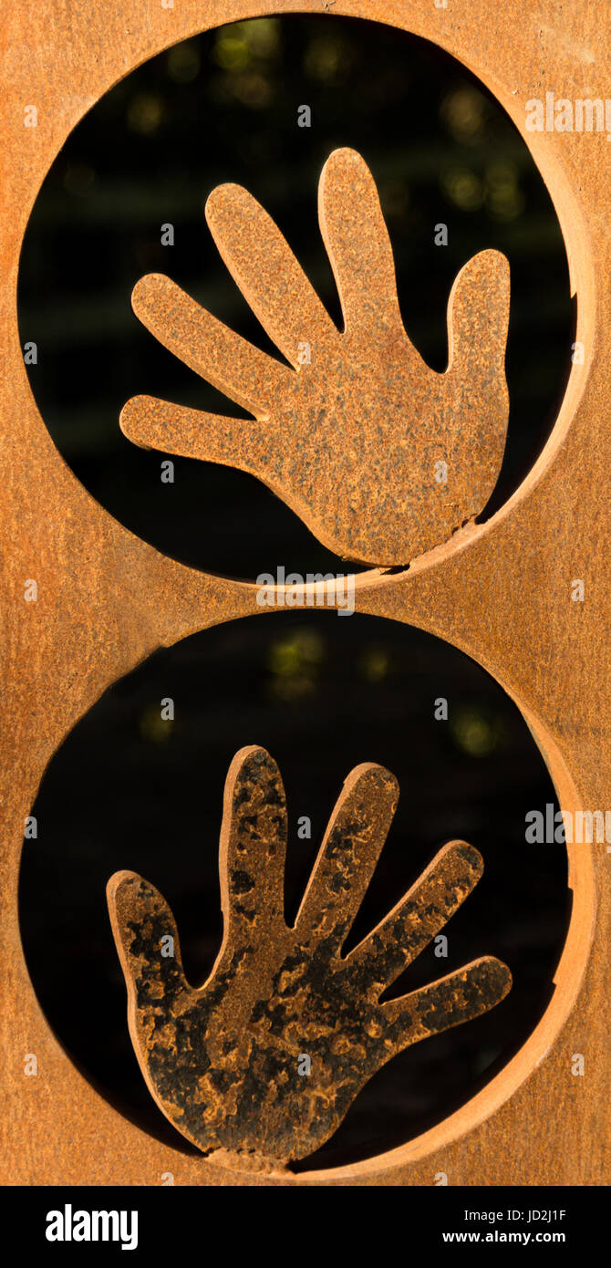 Shapes of hands made of steel Stock Photo - Alamy