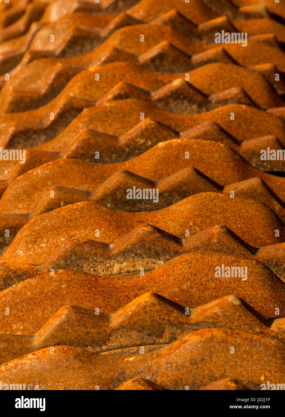 Steel rusted teeth used on a dirt roller Stock Photo - Alamy