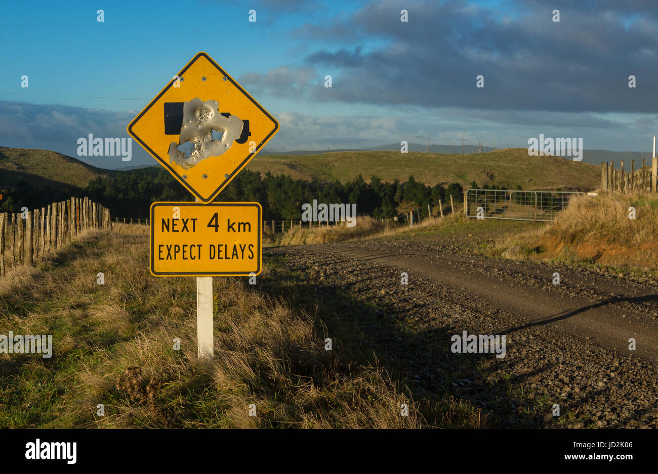 Road sign use for target practice with a shoot gun. Big holes Stock ...