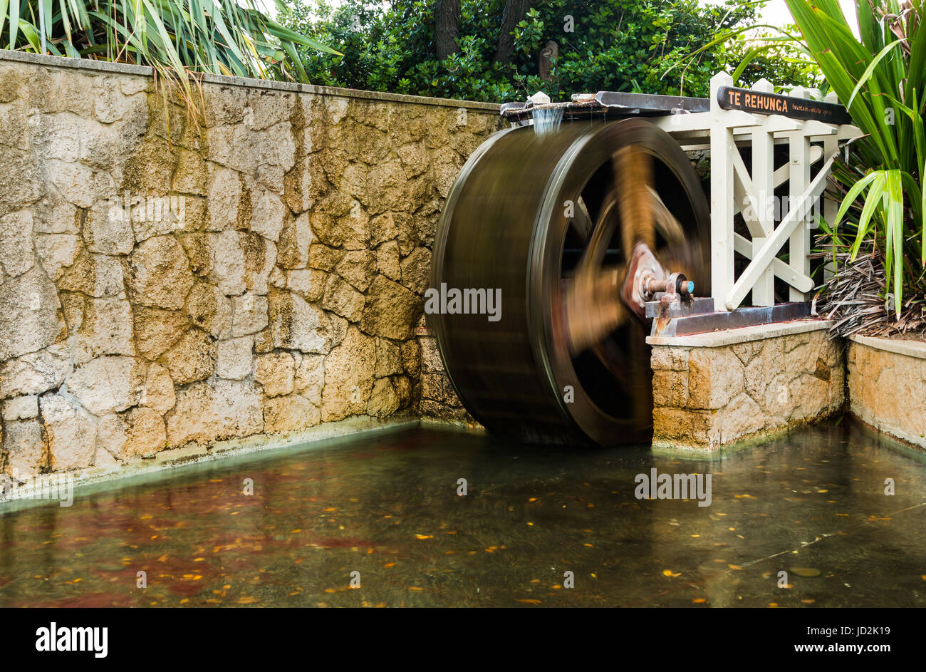 Te Renunga Water wheel spinning around Stock Photo - Alamy