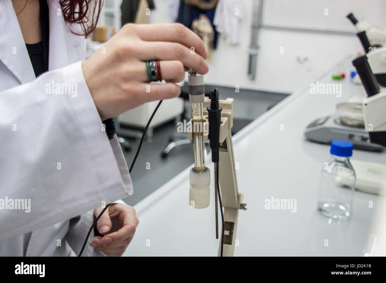 Scientist or researcher or PHD student take DNA samples from flask for ...