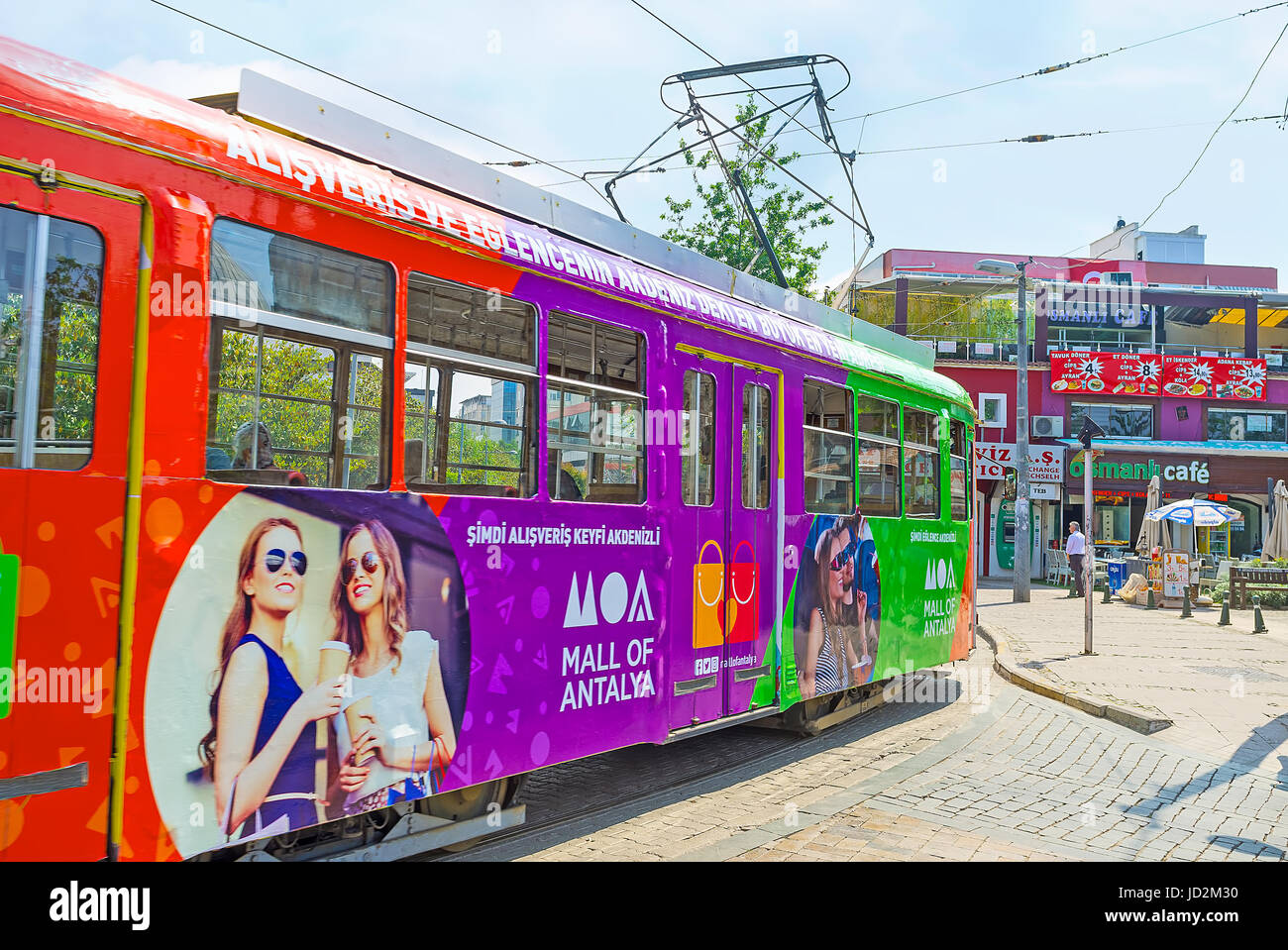ANTALYA, TURKEY - MAY 6, 2017: The colorful trams attract tourists to ...