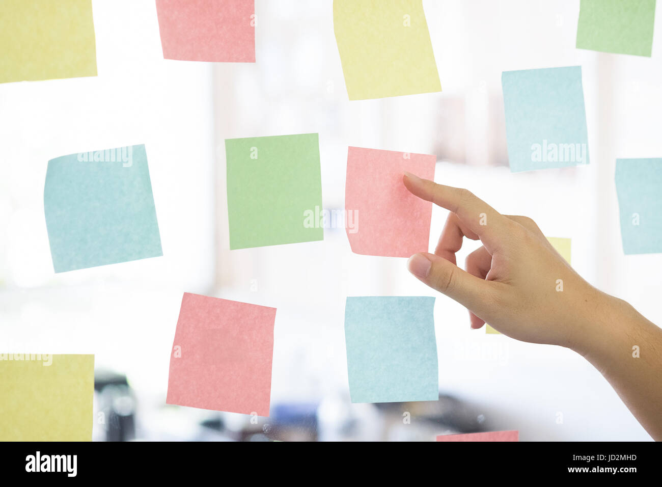 Sticky note paper reminder schedule on window. Use post it notes to ...