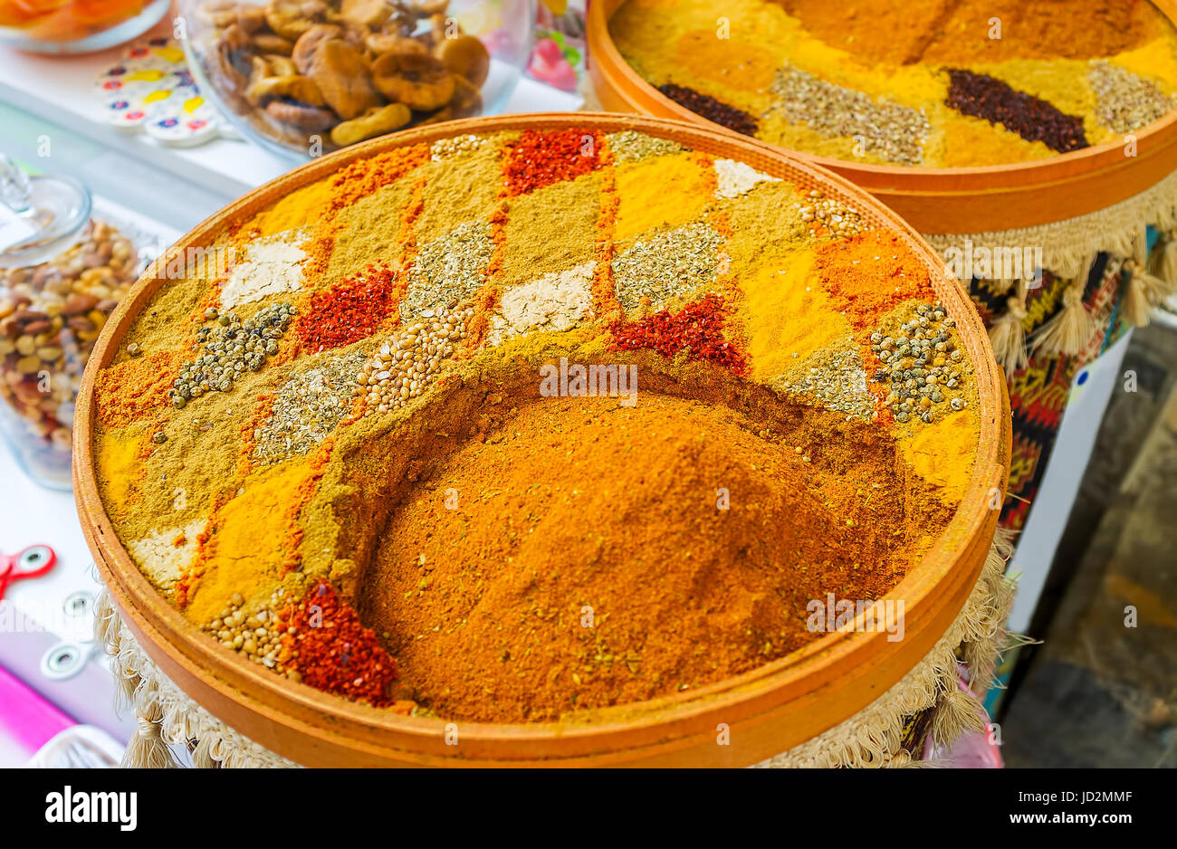 The mix of fragrant spices on the plate, decorated with patterns ...